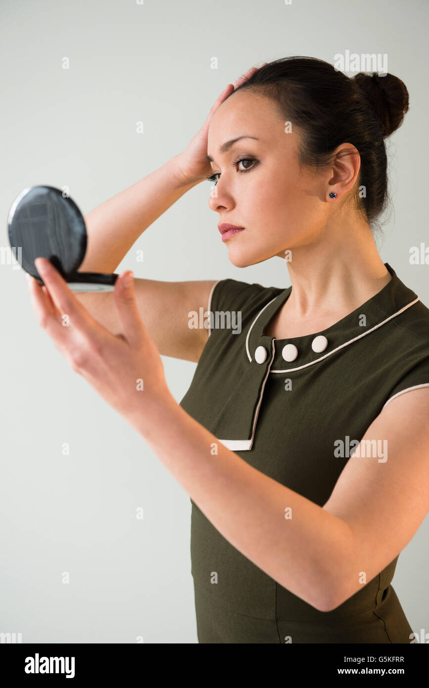 Hand holding mirror compact hi-res stock photography and images - Alamy