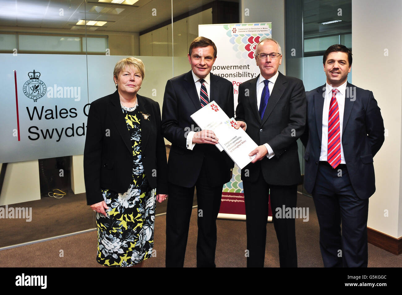 Paul Silk (second right), hands David Jones MP, Secretary of State for ...