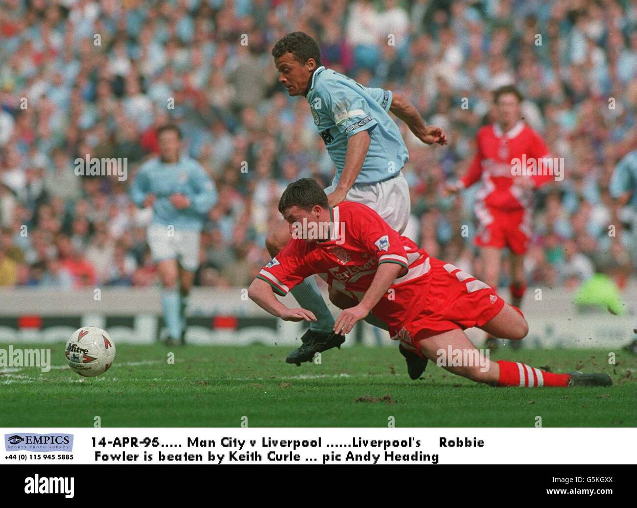 Liverpools robbie fowler is beaten by keith curle hi-res stock ...