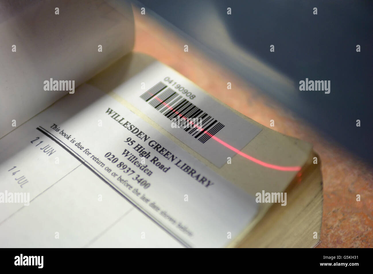 Librarian issuing book in library hi-res stock photography and images ...