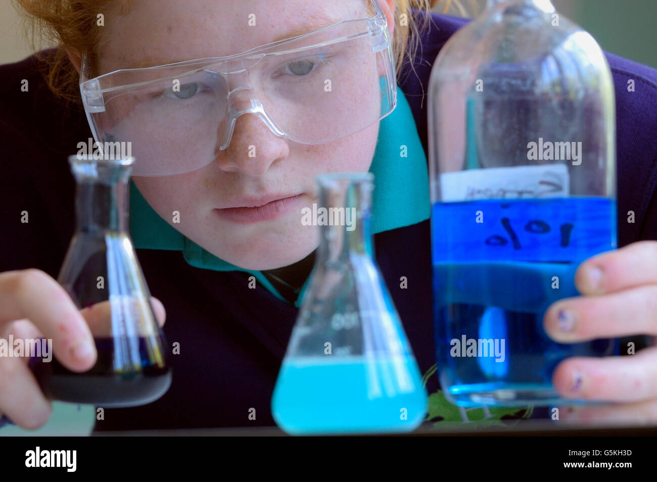 Schoolgirl doing a science experiment. England. UK Stock Photo - Alamy