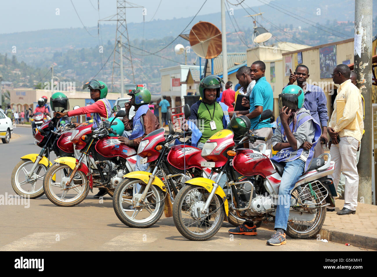 Motorcycle Taxis waiting for customers in the capital Kigali, Rwanda ...