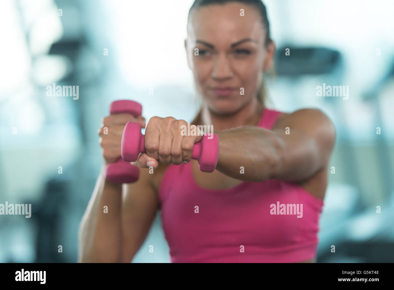 Muscular Boxer Woman MMA Fighter Practice Her Skills With Dumbbells In ...