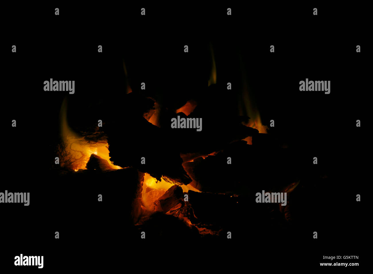 Photograph of charcoal pieces and fire flames Stock Photo - Alamy