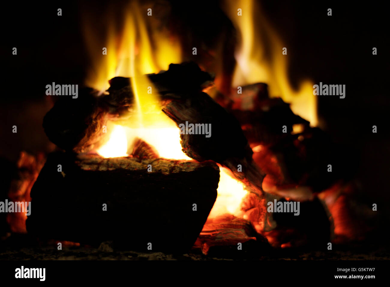 Photograph of charcoal pieces and fire flames Stock Photo - Alamy