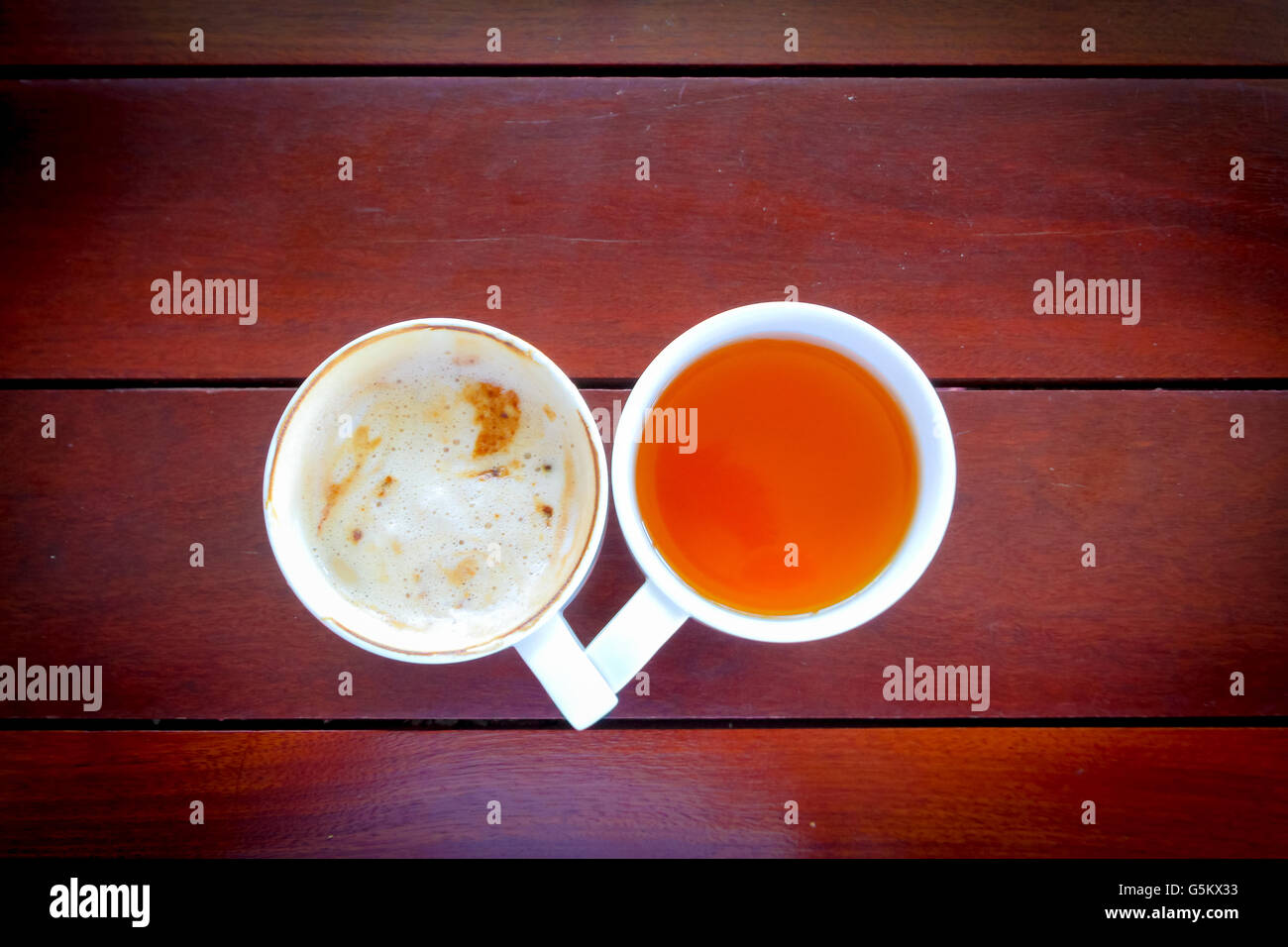 delicious cup until completely empty coffee cup on wood table Stock ...