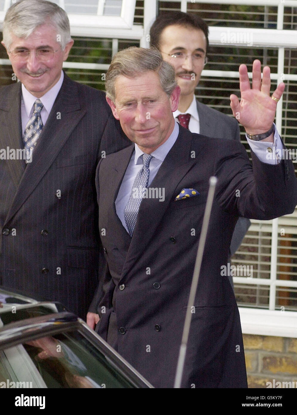 The Prince of Wales waves to the crowd after a visit to the Suleymaniye ...