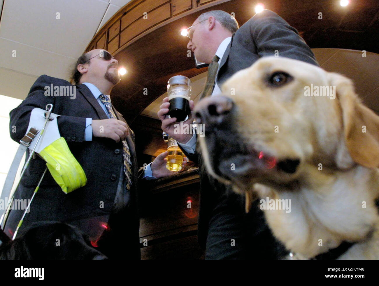 Visually impaired Roger Bailey, (L) speaks with Derek Thorpe, (R) with ...