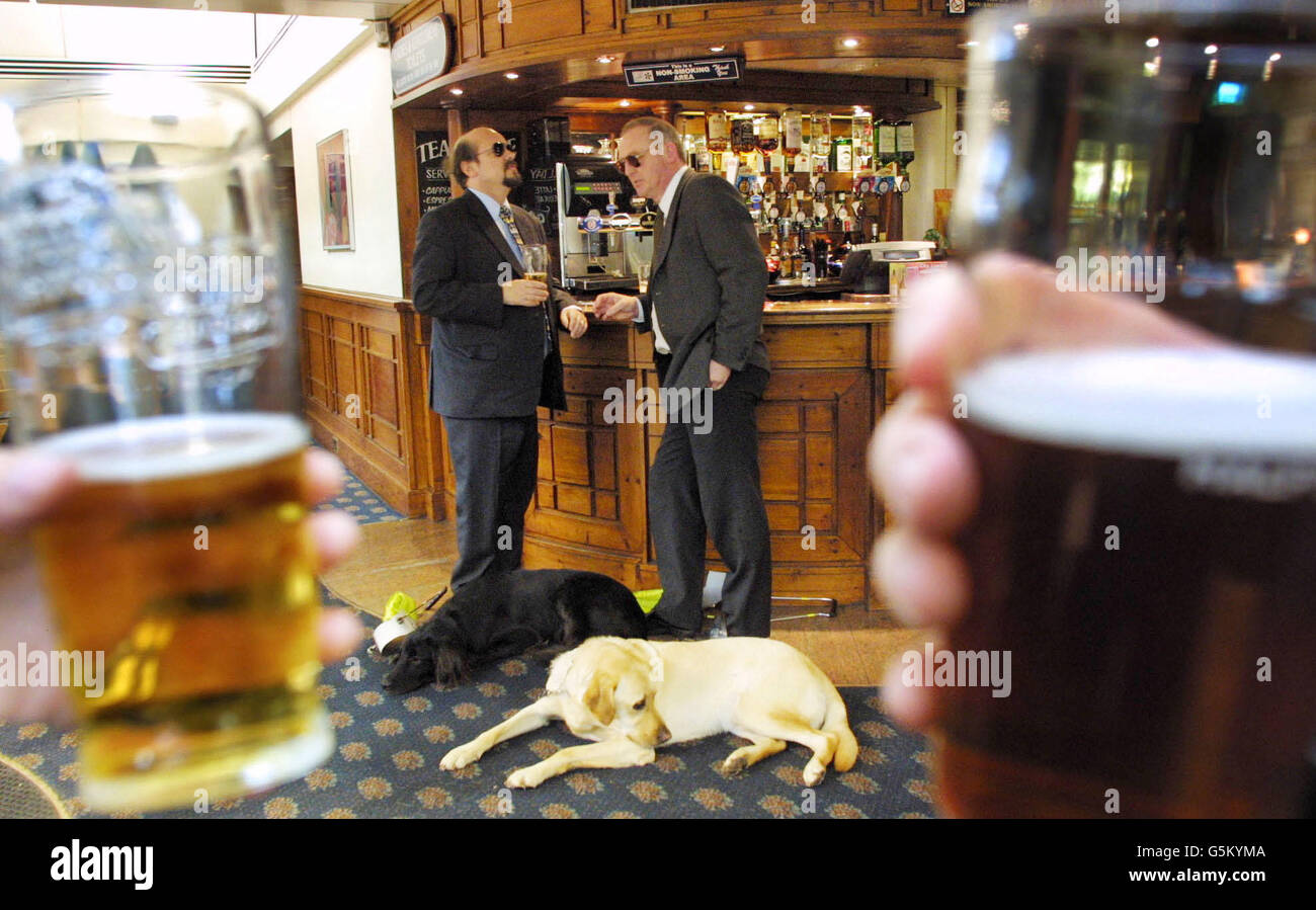 Visually impaired Roger Bailey, (L) speaks with Derek Thorpe, (R) with ...