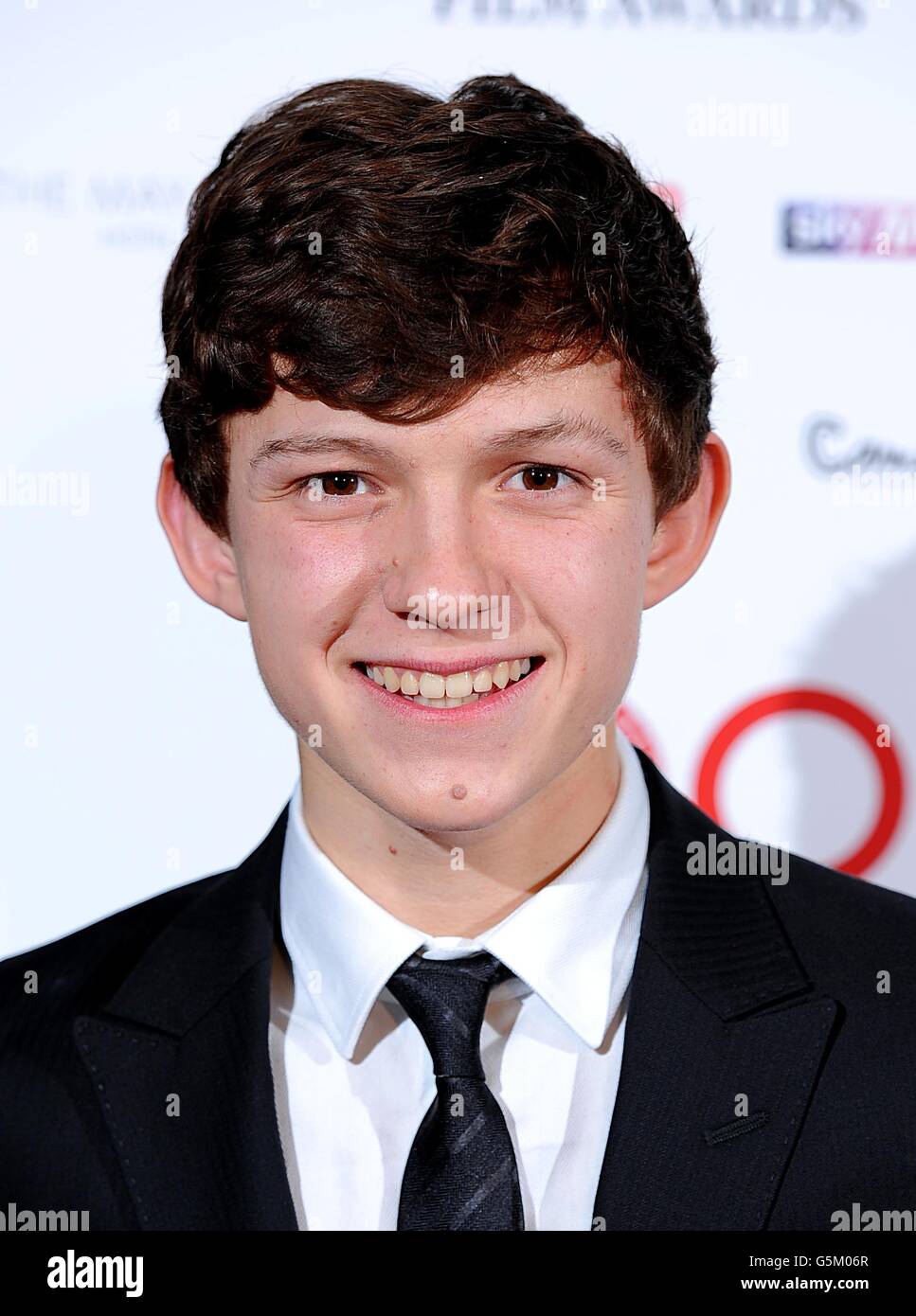 Tom Holland arriving for the 2013 London Critics' Circle Film Awards at ...