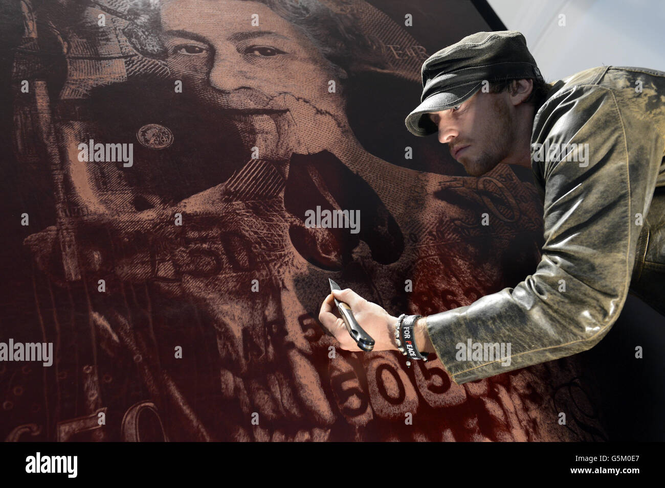 Portraits carved in leather Stock Photo - Alamy