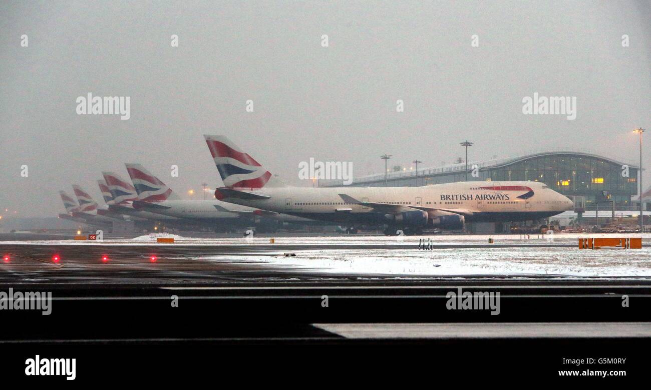Winter weather Jan 20th. Planes in the snow at Heathrow Airport Stock ...