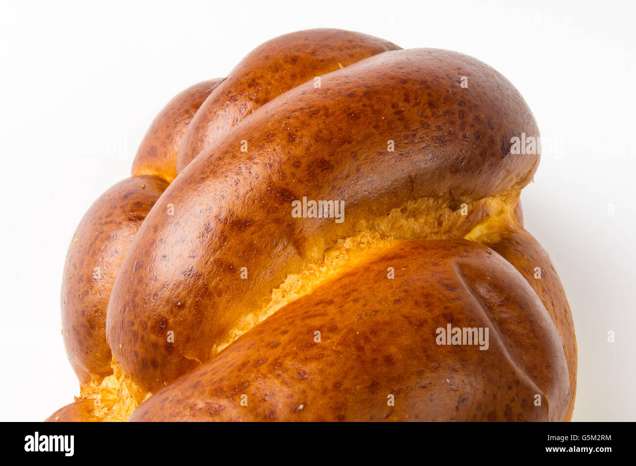 chunks large braided loaf on white background Stock Photo - Alamy