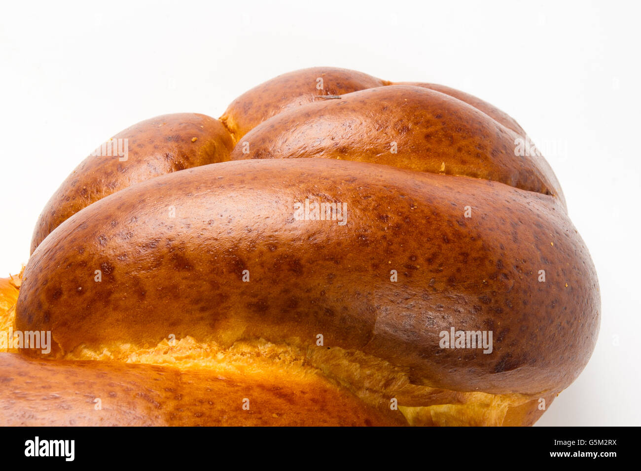 chunks large braided loaf on white background Stock Photo - Alamy