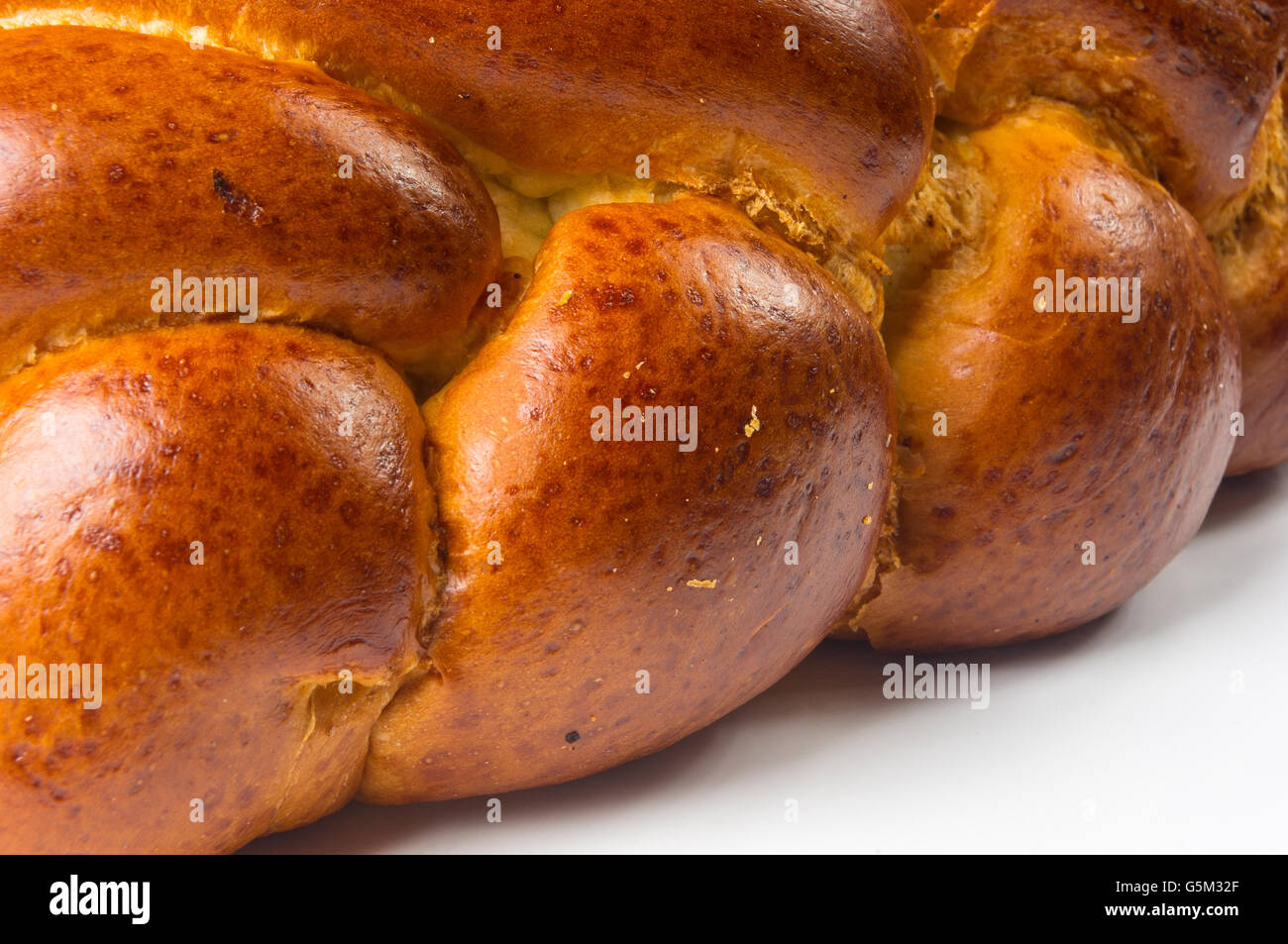 chunks large braided loaf on white background Stock Photo - Alamy