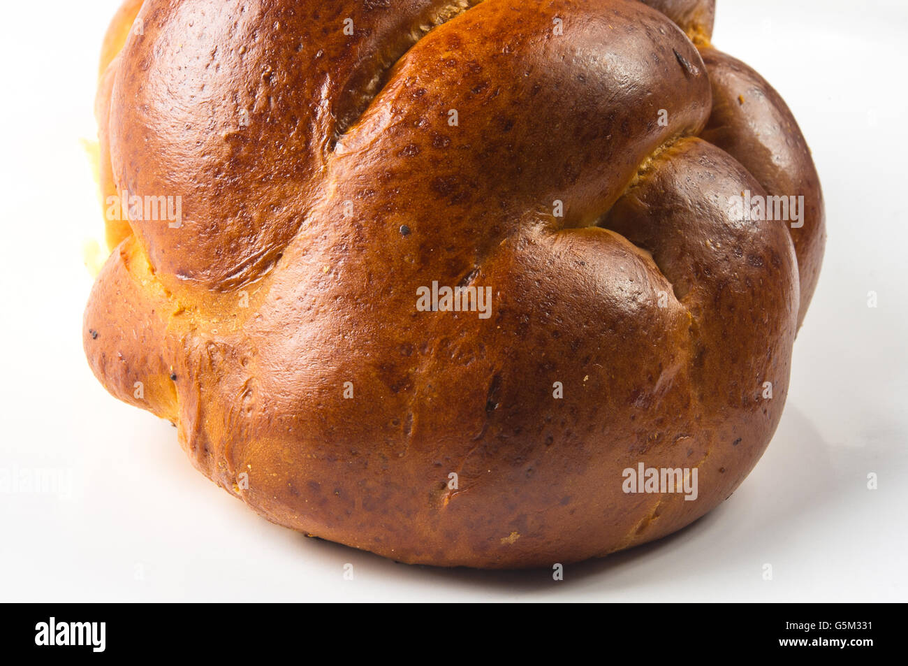 chunks large braided loaf on white background Stock Photo - Alamy