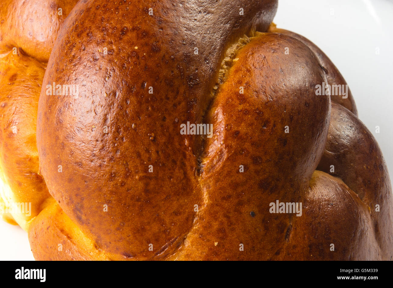 chunks large braided loaf on white background Stock Photo - Alamy