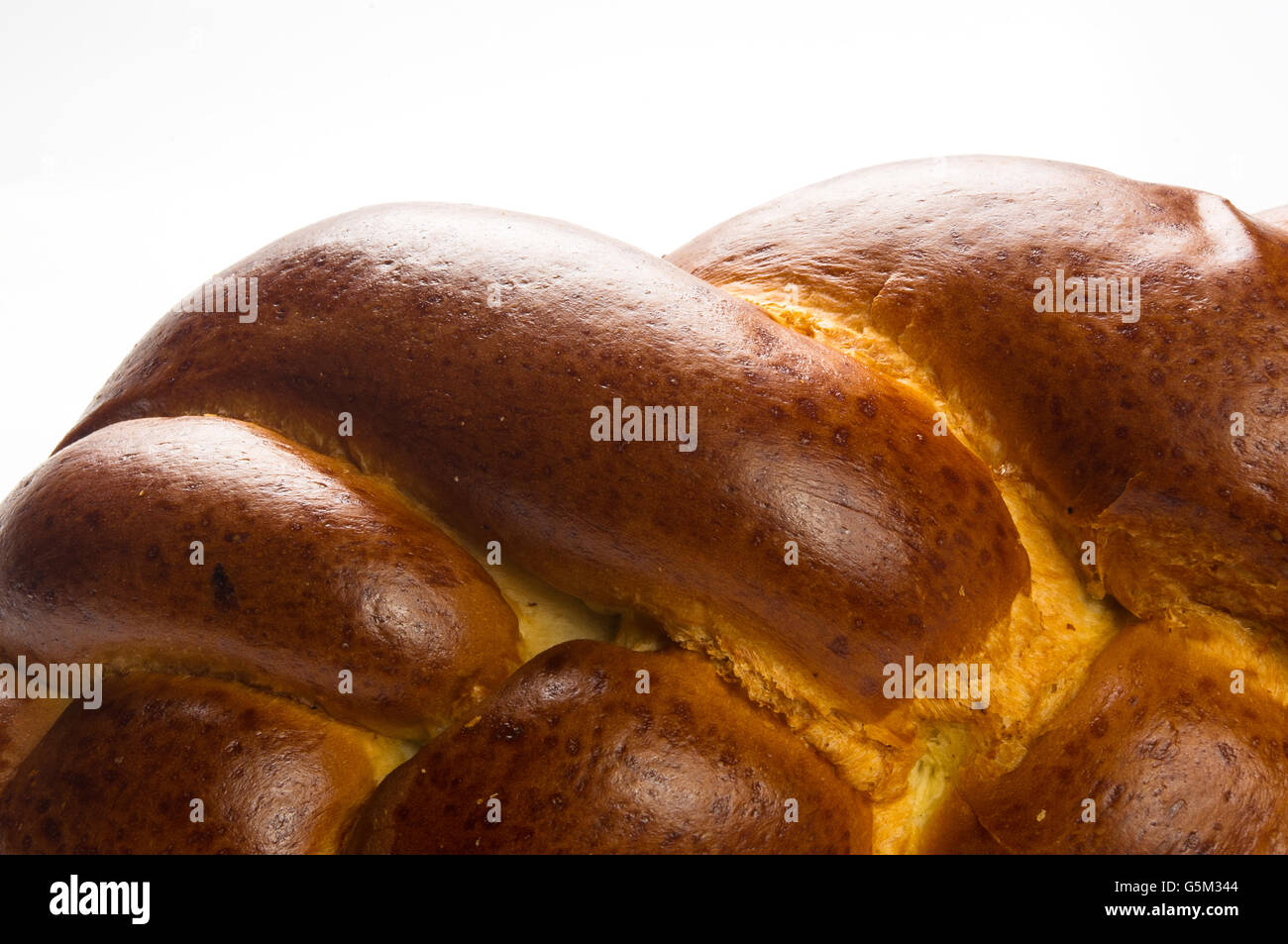 chunks large braided loaf on white background Stock Photo - Alamy