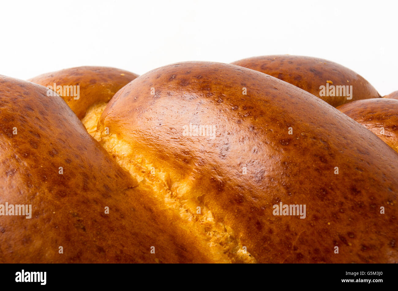 chunks large braided loaf on white background Stock Photo - Alamy