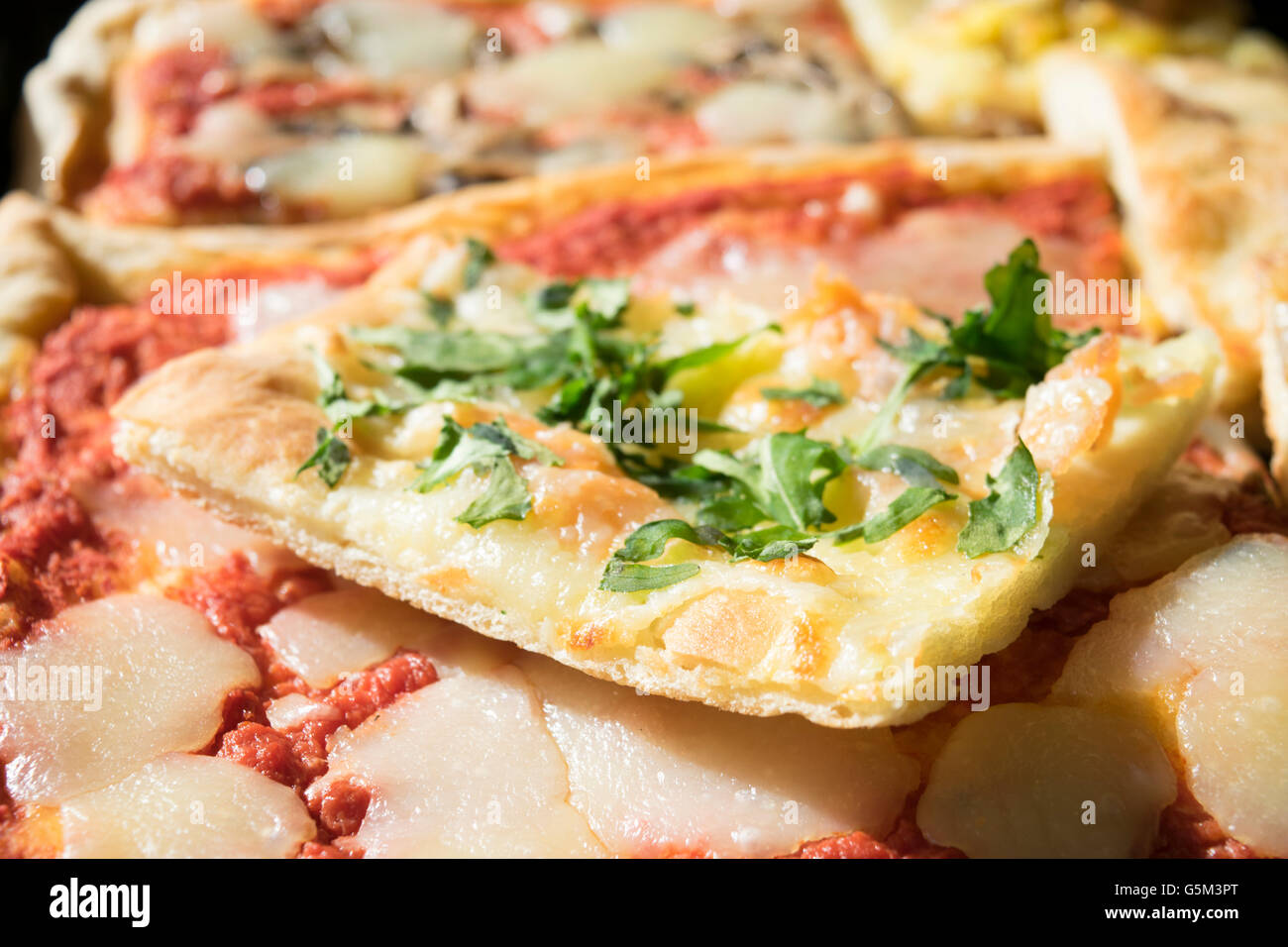 wedge of homemade pizza with salmon mozzarella and arugula Stock Photo ...