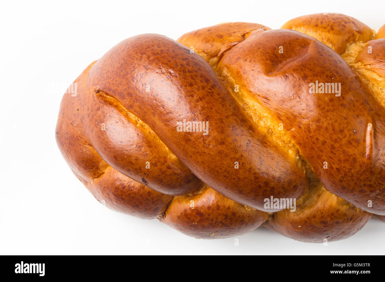 chunks large braided loaf on white background Stock Photo - Alamy