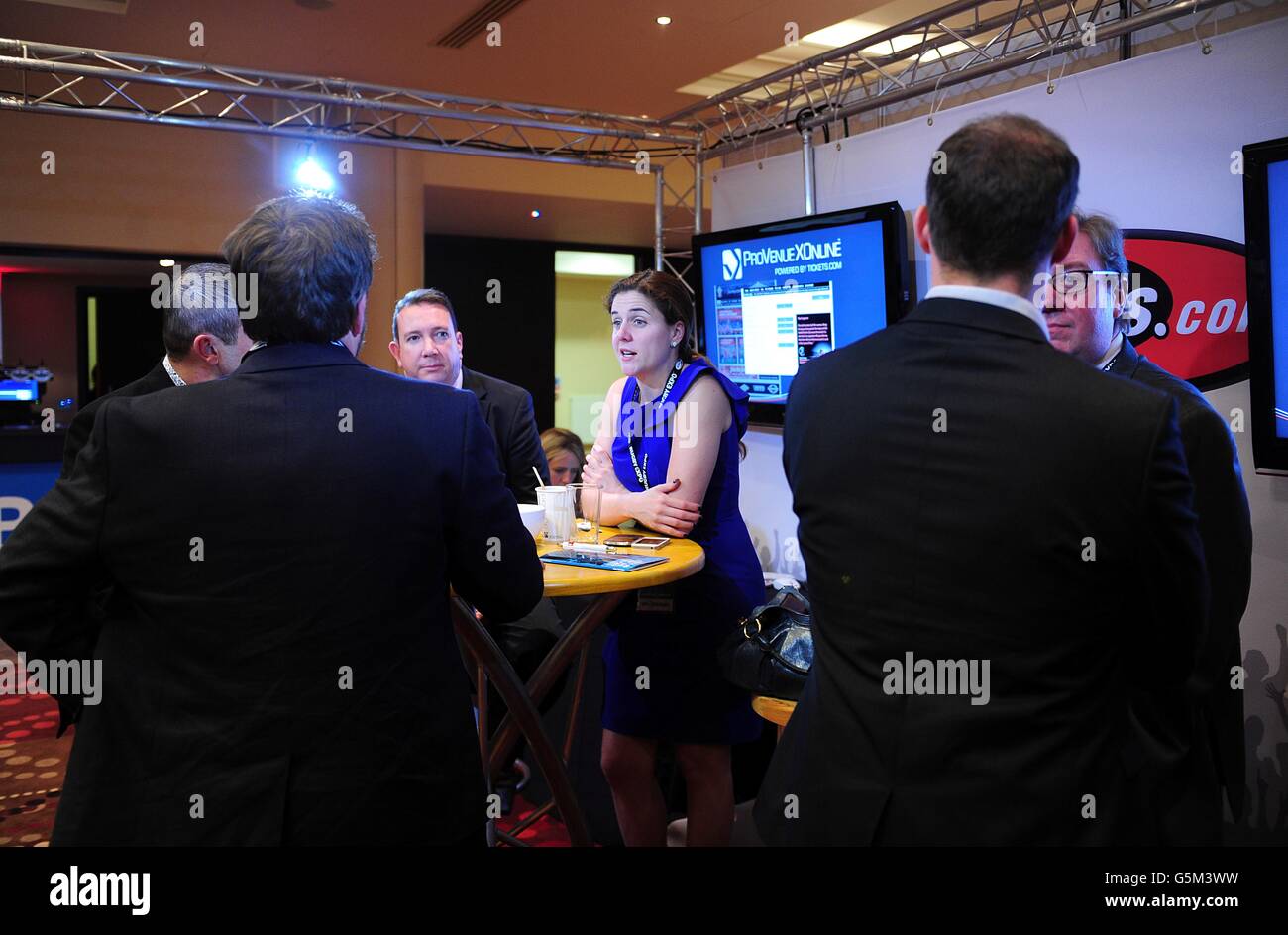 Delegates stand hi-res stock photography and images - Alamy