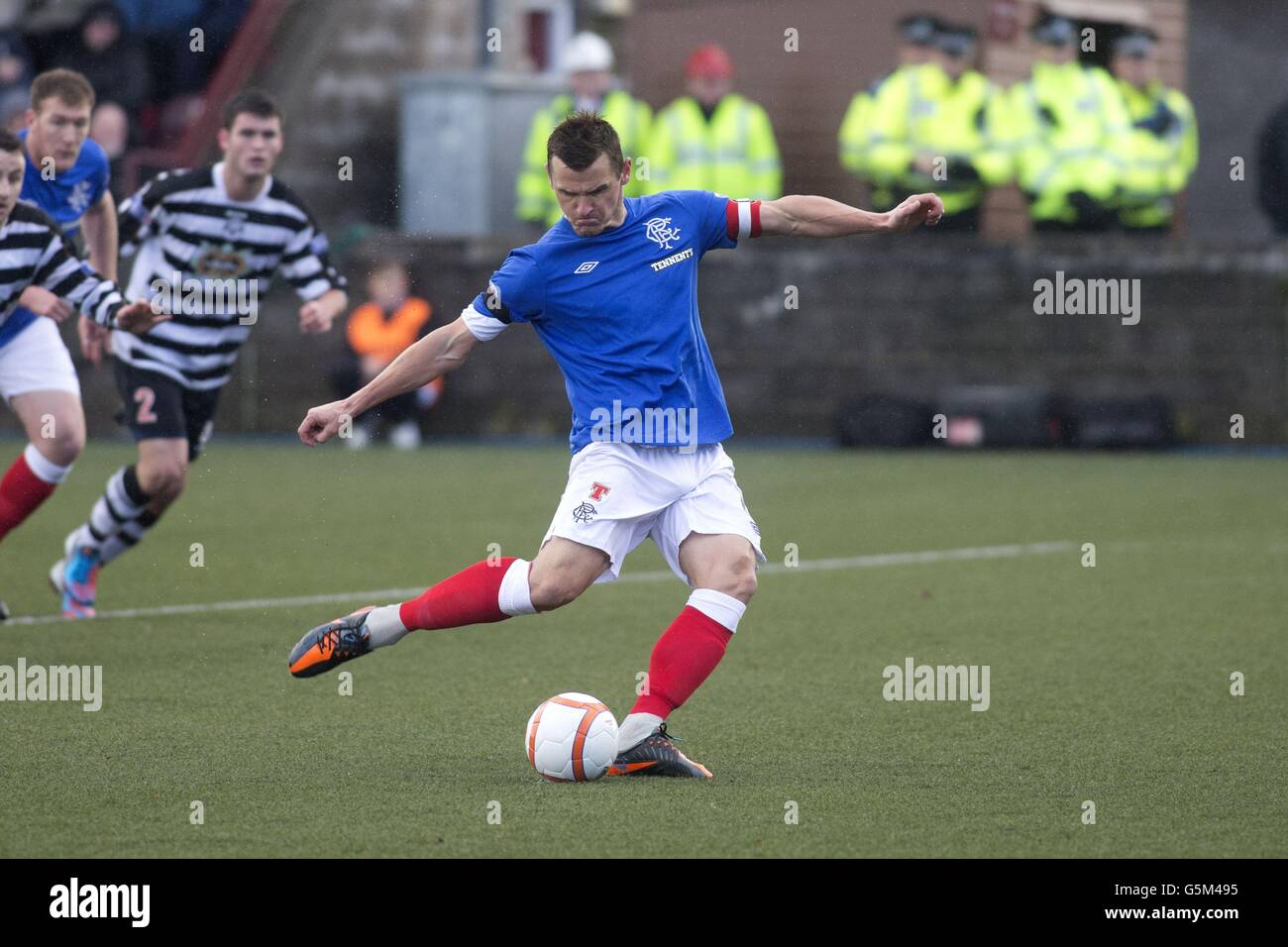 Rangers captain Lee McCulloch scores the opening goal from the penalty ...