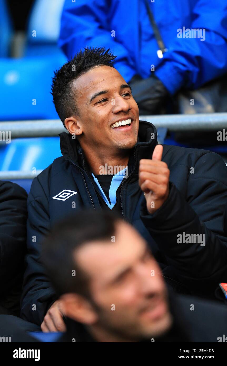 Manchester citys scott sinclair on the bench hi-res stock photography ...