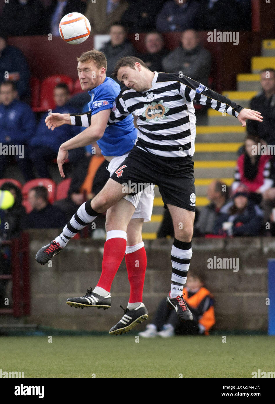 Rangers' Kevin Kyle and East Stirlingshire's Ricky Miller (right ...