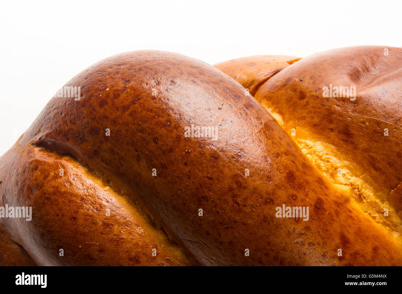 chunks large braided loaf on white background Stock Photo - Alamy