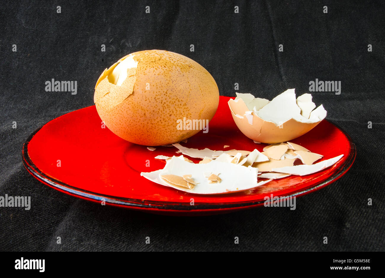 the bachelor dinner - boiled eggs with a broken shell Stock Photo - Alamy