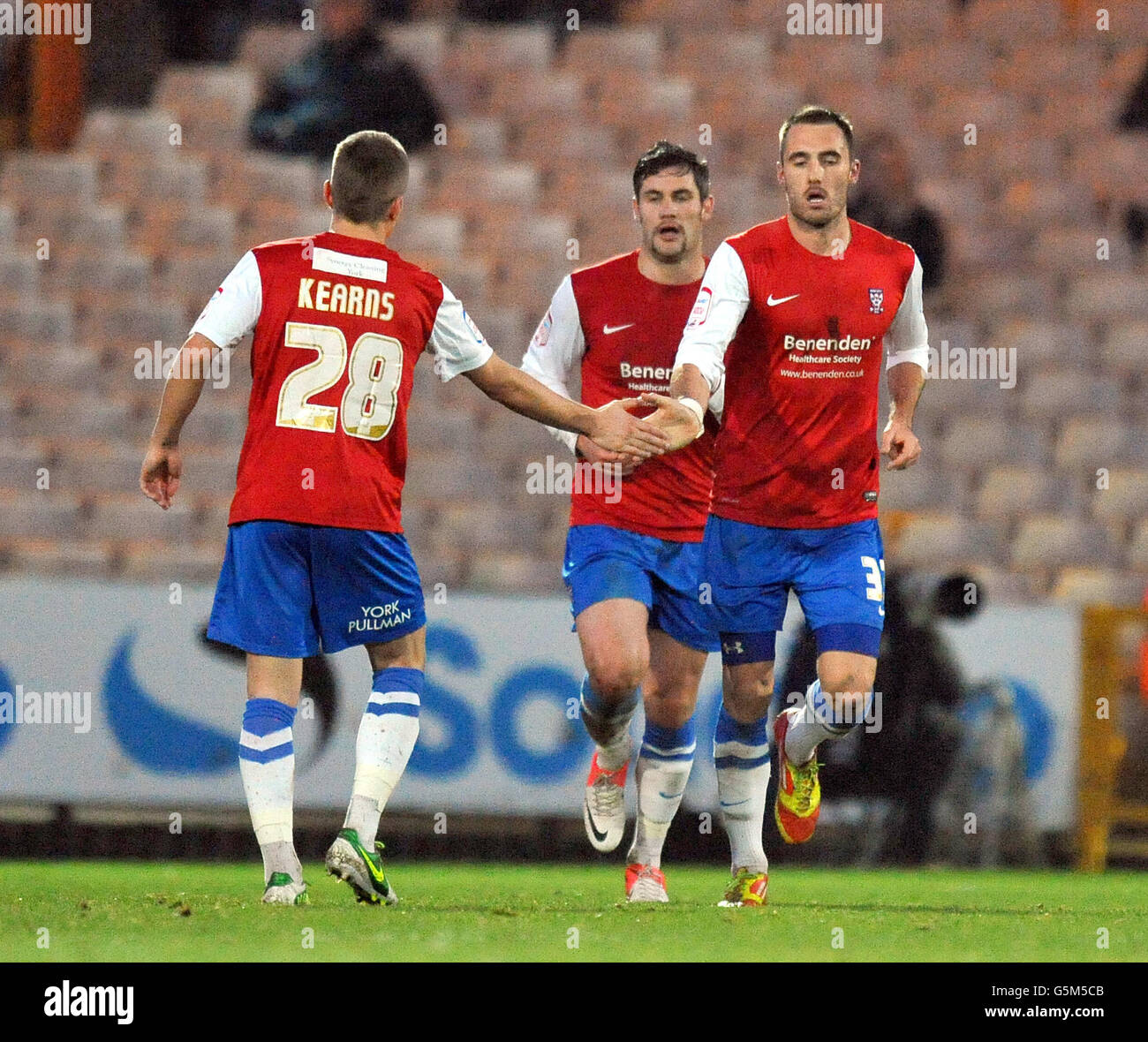 Yorks City's Alex Rodman is congratulated on scoring by Danny Kearns ...