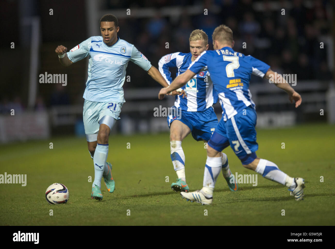 Hartlepool United's Jonathan Franks and Coventry City's Cyrus Christie ...
