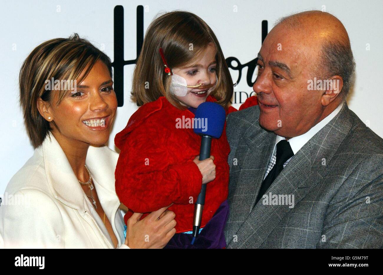 Victoria Beckham and Harrods owner Mohammed Al Fayed, with six year old ...