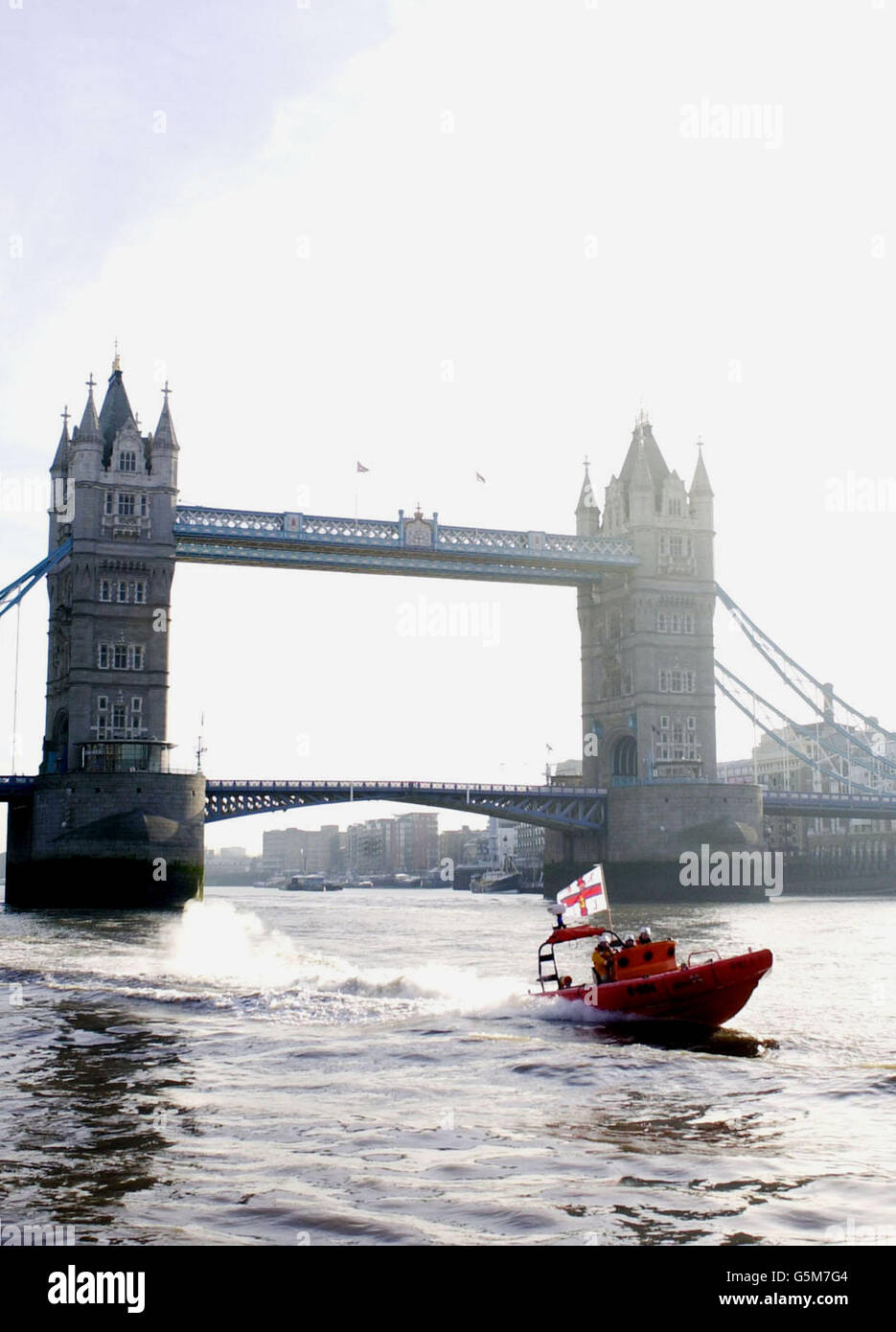 Royal national lifeboat institution rnli boat along river hi-res stock ...
