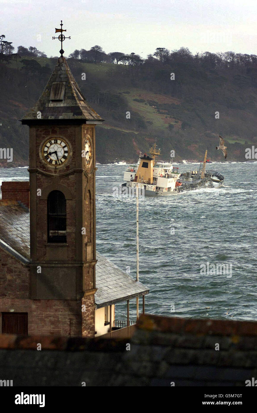 The high tide washes over the deck of the 3,000 tonne Cypriot ...