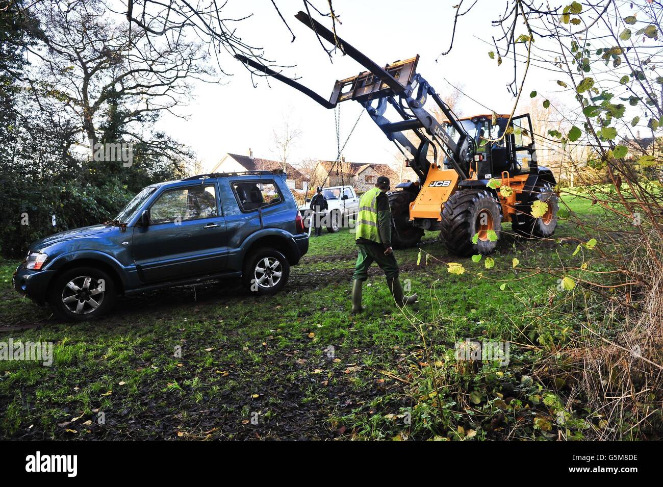 A 4x4 car is removed from the scene where a man died after becoming ...