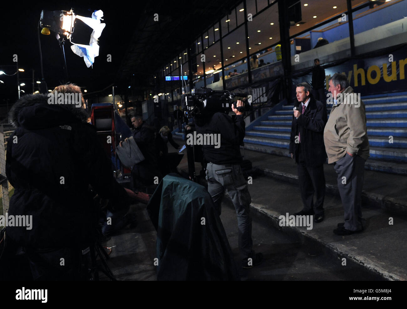 Presenter Darrell Williams and the Sky Sports Greyhound team Stock ...