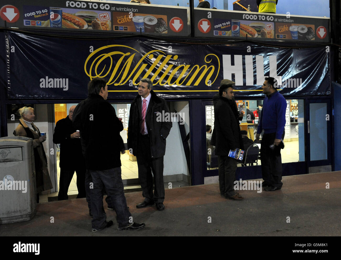 Presenter Darrell Williams and the Sky Sports Greyhound team Stock ...