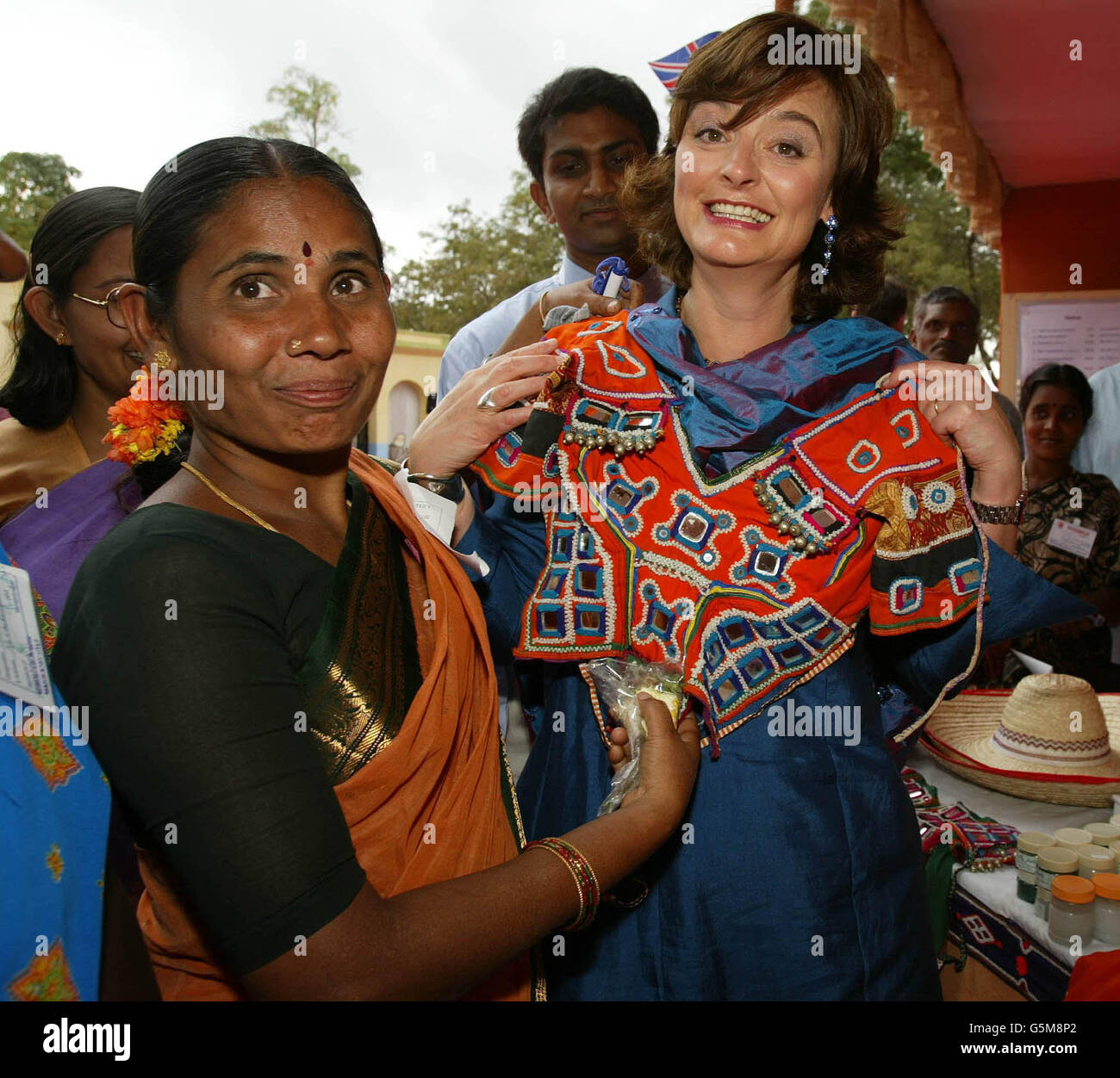 The wife of Britain's Prime Minister Tony Blair, Cherie, visits a ...