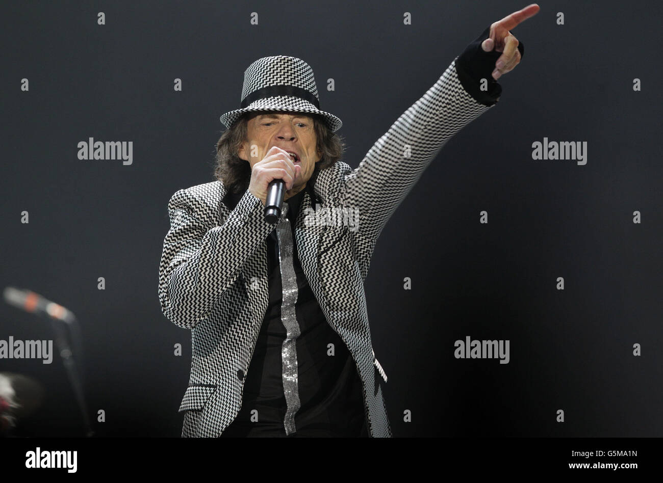 Mick Jagger of The Rolling Stones performing at the O2 Arena in London ...