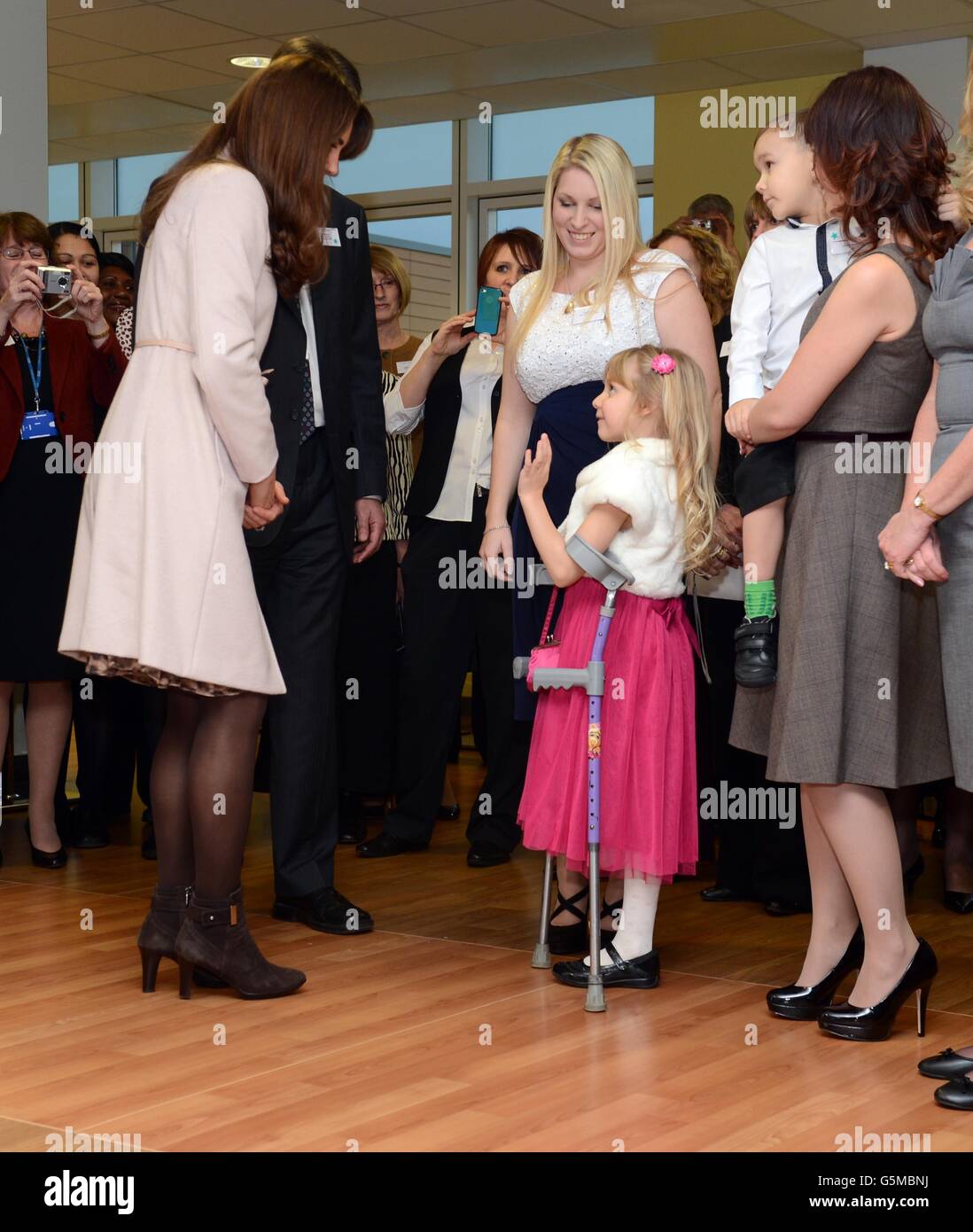 The duchess cambridge meets emma henson hi-res stock photography and ...