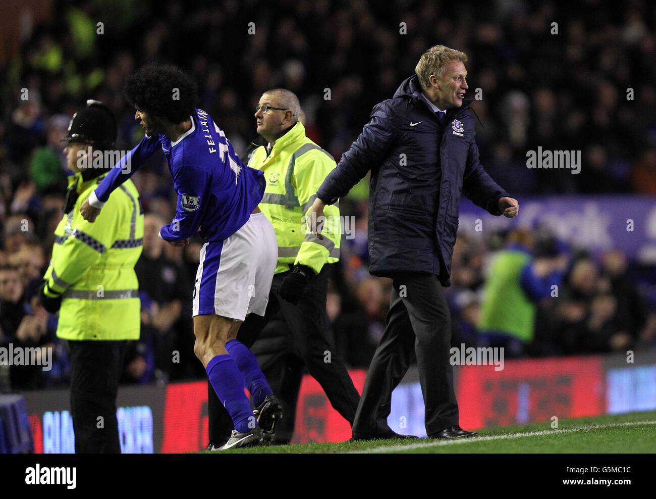 Everton's Marouane Fellaini celebrates scoring a equalising goal to ...