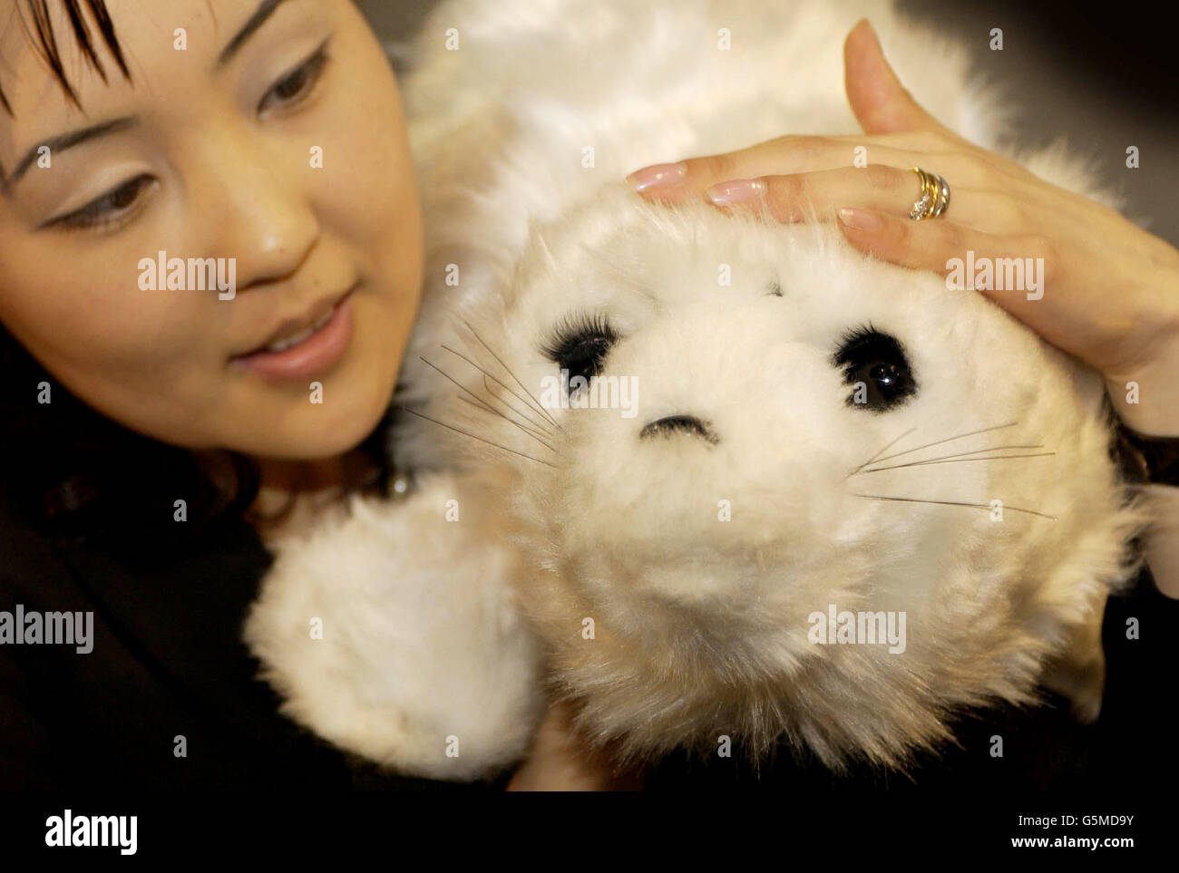 Paro, a robotic seal, is demonstrated at the Japan: Gateway To The ...
