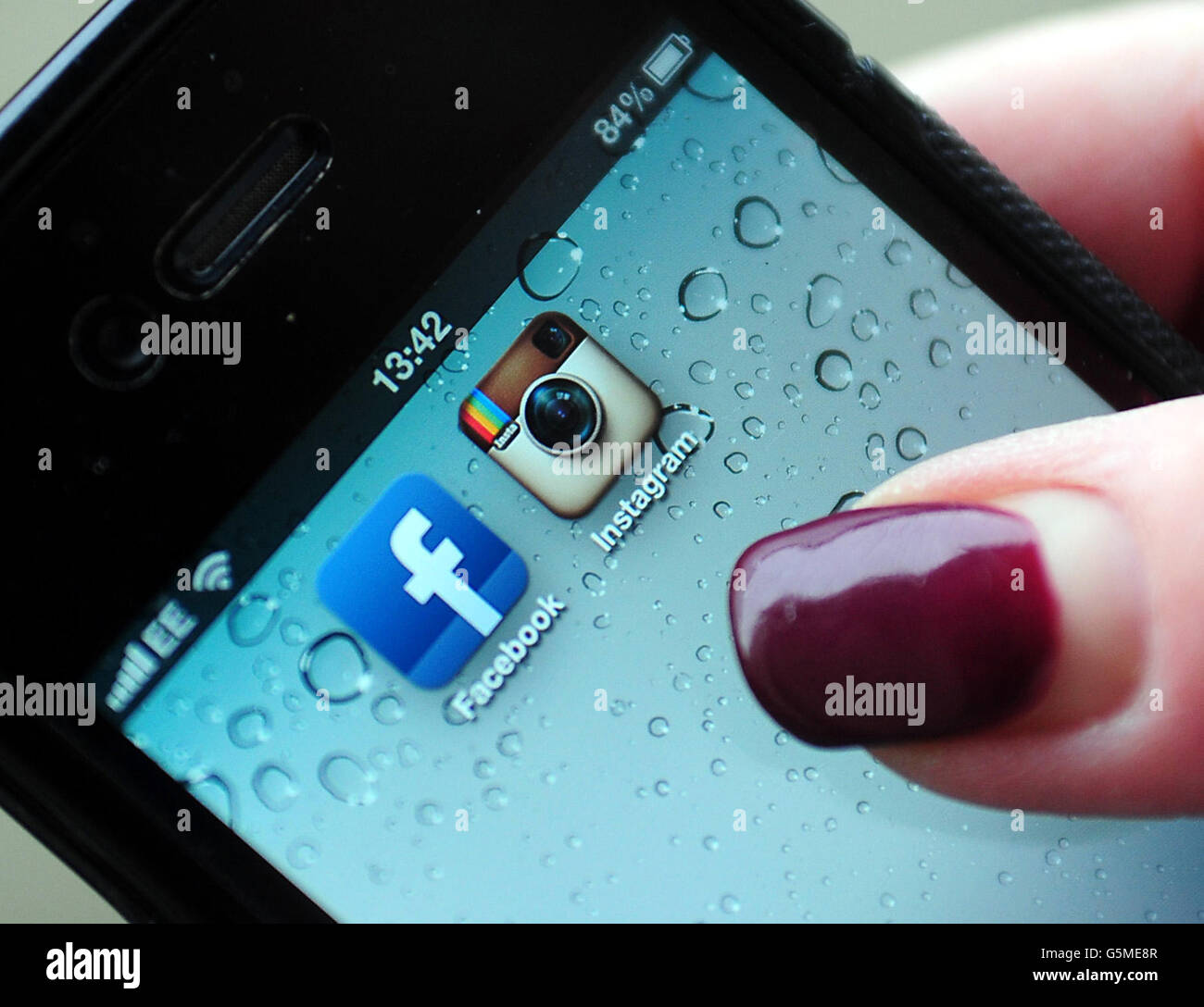 General view of Instagram and Facebook logos on a smartphone. Tensions ...