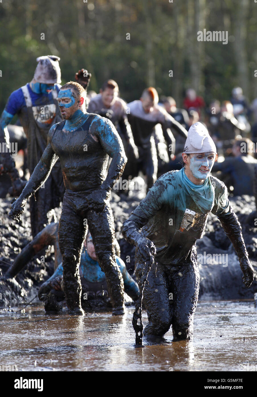 Competitors make their way through kiss of mud 2 hi-res stock ...