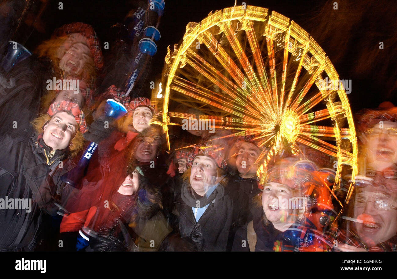New Years Eve revellers get into the festive spirit near the Big Wheel ...