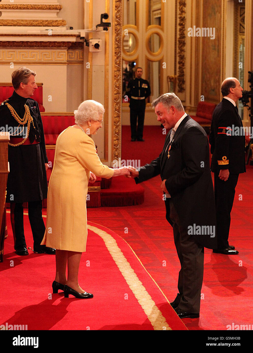 Awarded in investiture ceremony buckingham palace hi-res stock ...