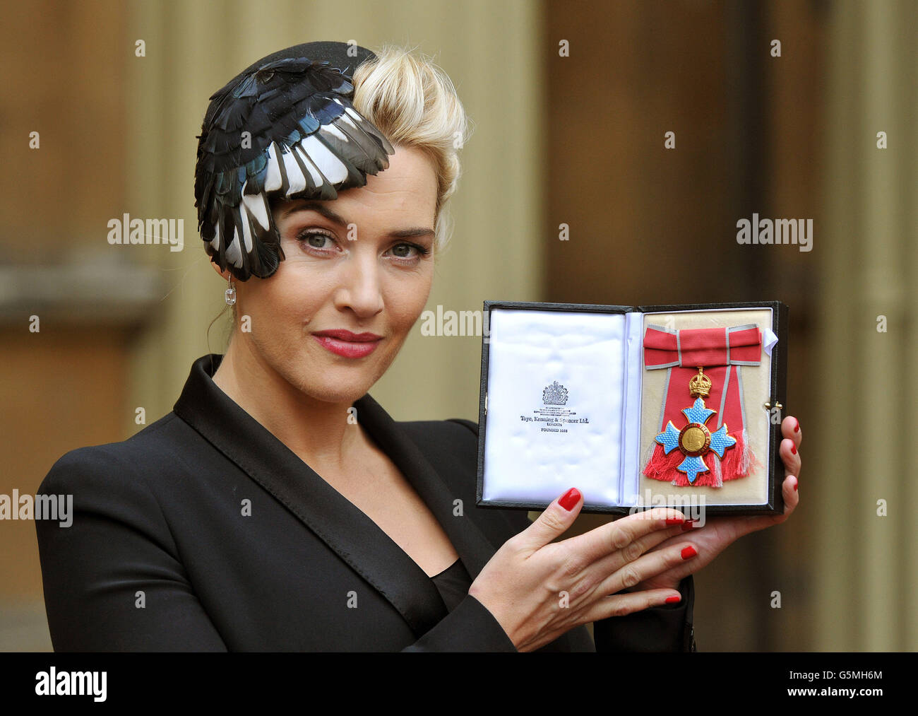 Actress Kate Winslet holds her CBE, for services to drama, which was ...