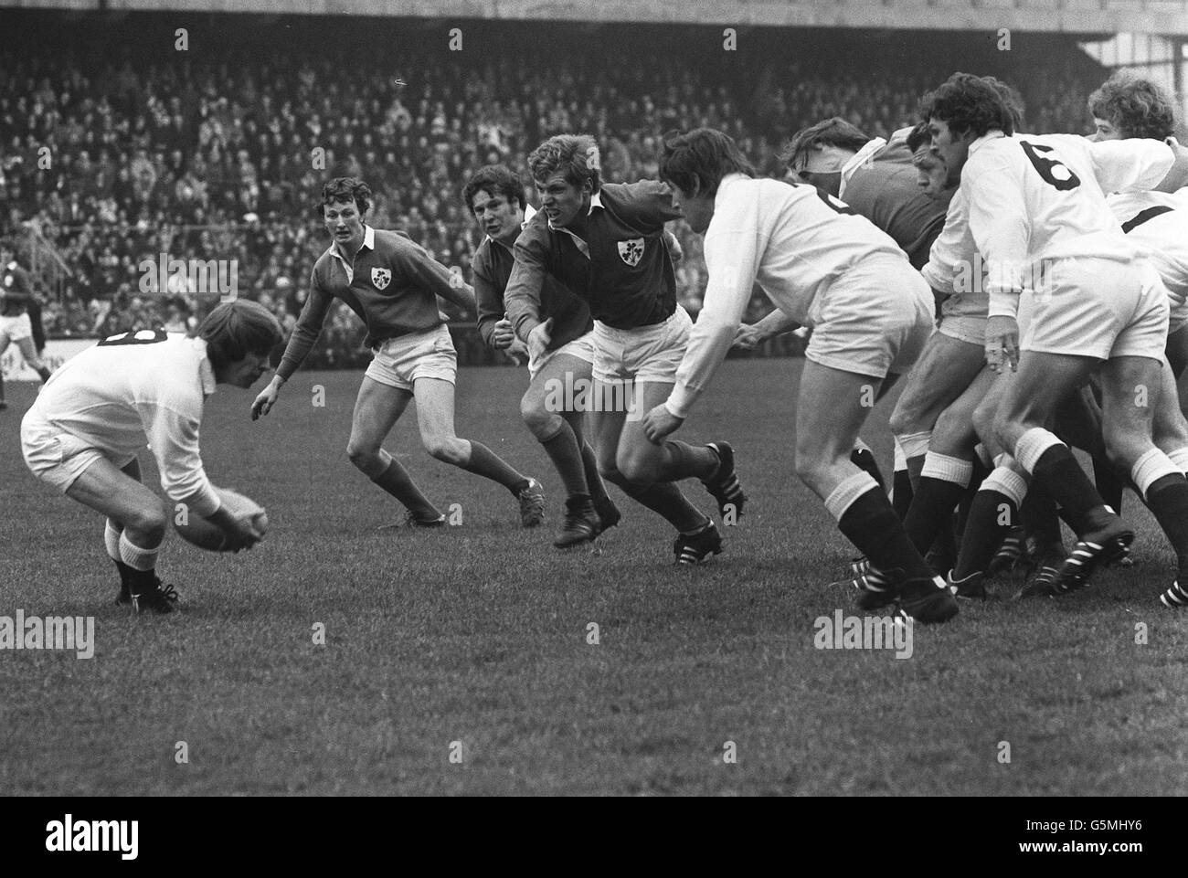 Ireland's John Fergus Slattery (centre, dark shirt) leads an Irish ...